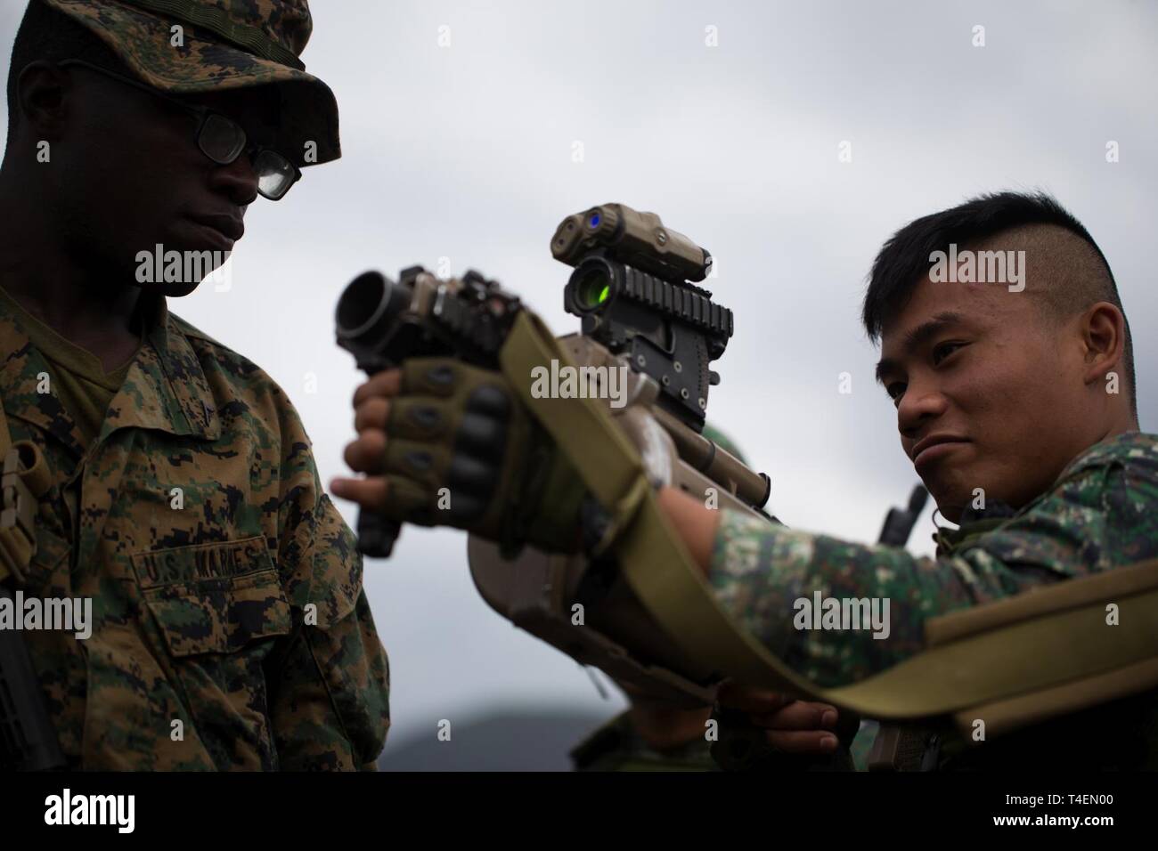 U.S. Marine Corps Lance Cpl. Mcguiver Belhette with India Company, 3rd ...