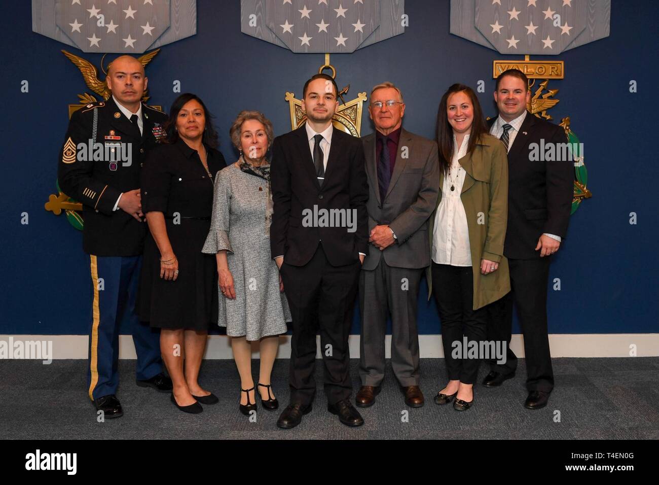 Travis Oliver, son of Staff Sgt. Travis Atkins, poses with family and ...