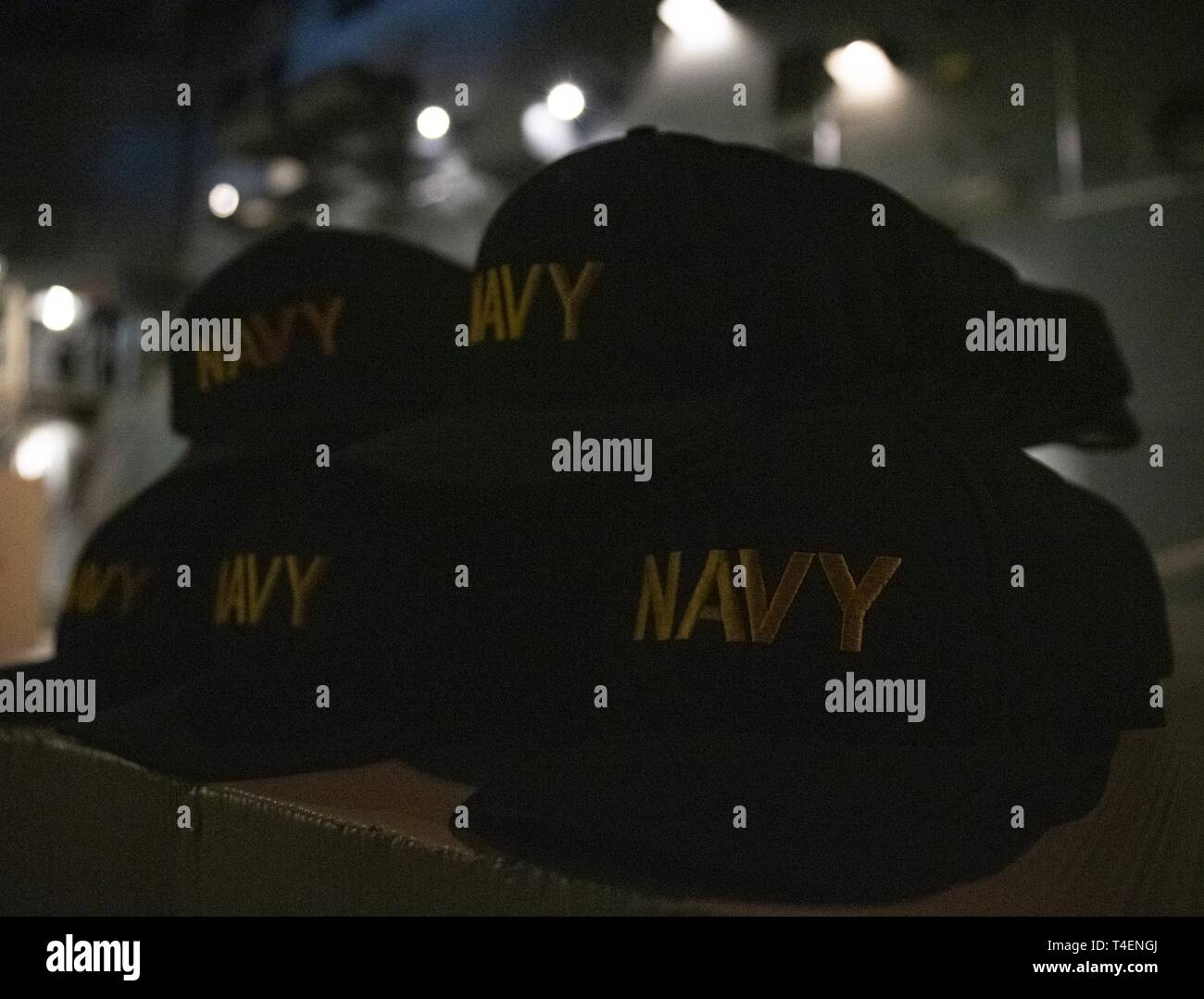 GREAT LAKES, Ill. (April 2, 2019) Navy ballcaps are staged for a ...