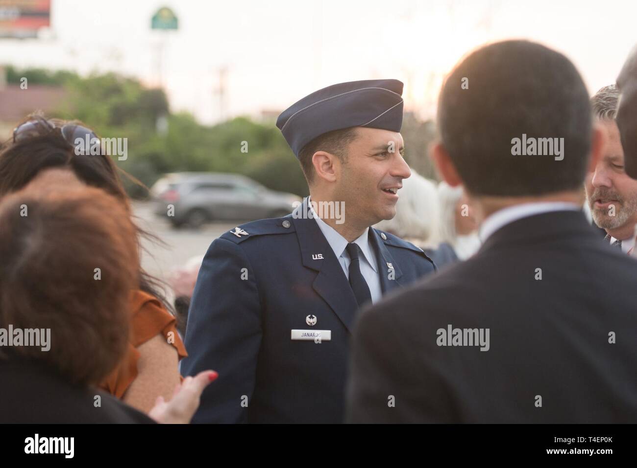 Col. Jason Janaros, 37th Training Wing, commander, speaks with other ...