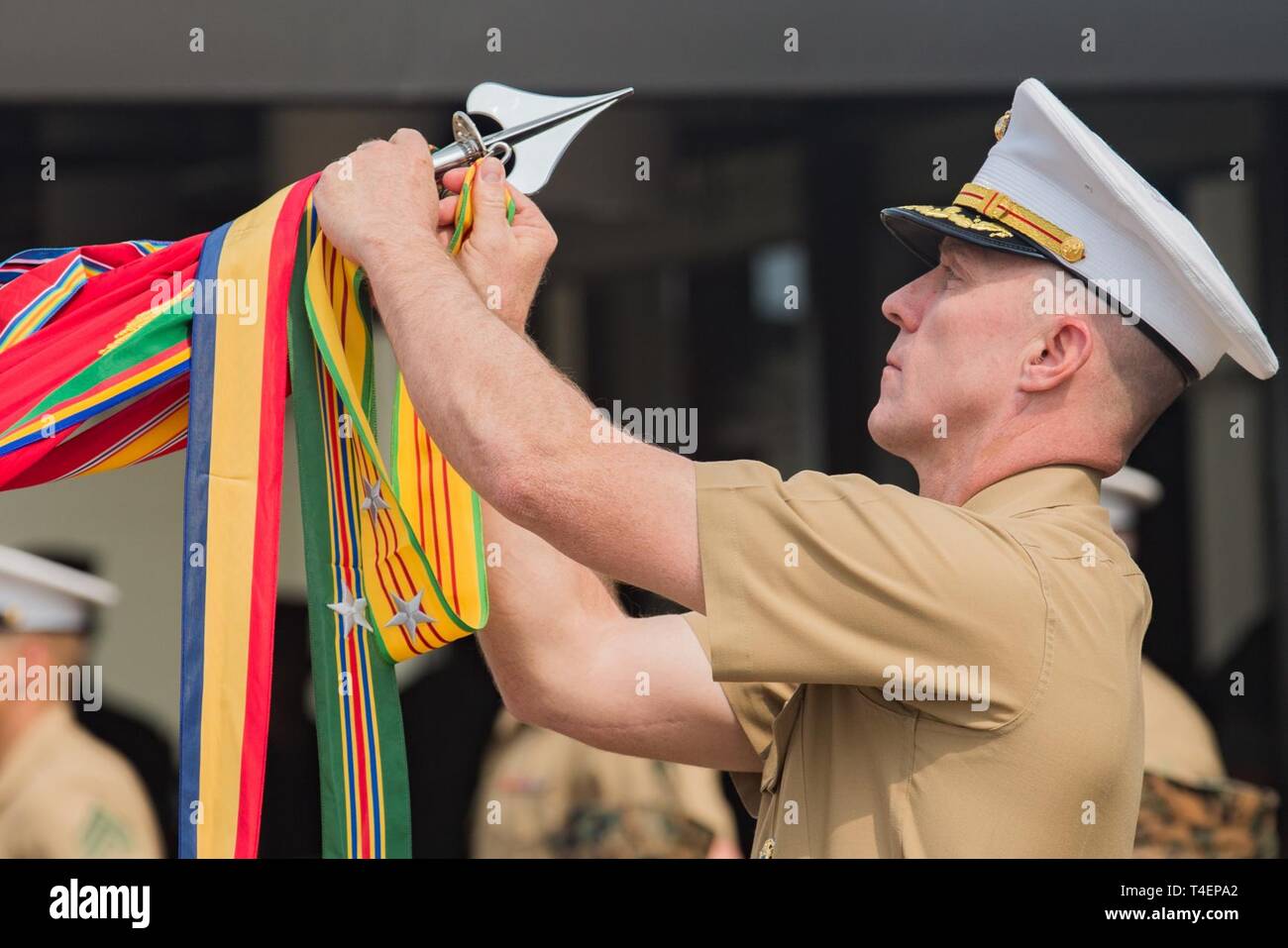 U.S. Marines of Marine Air Control Group 18 (MACG-18) adorn battle ...