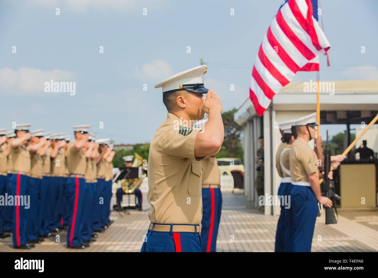 U.S. Marines of Marine Air Control Group 18 (MACG-18) adorn battle ...