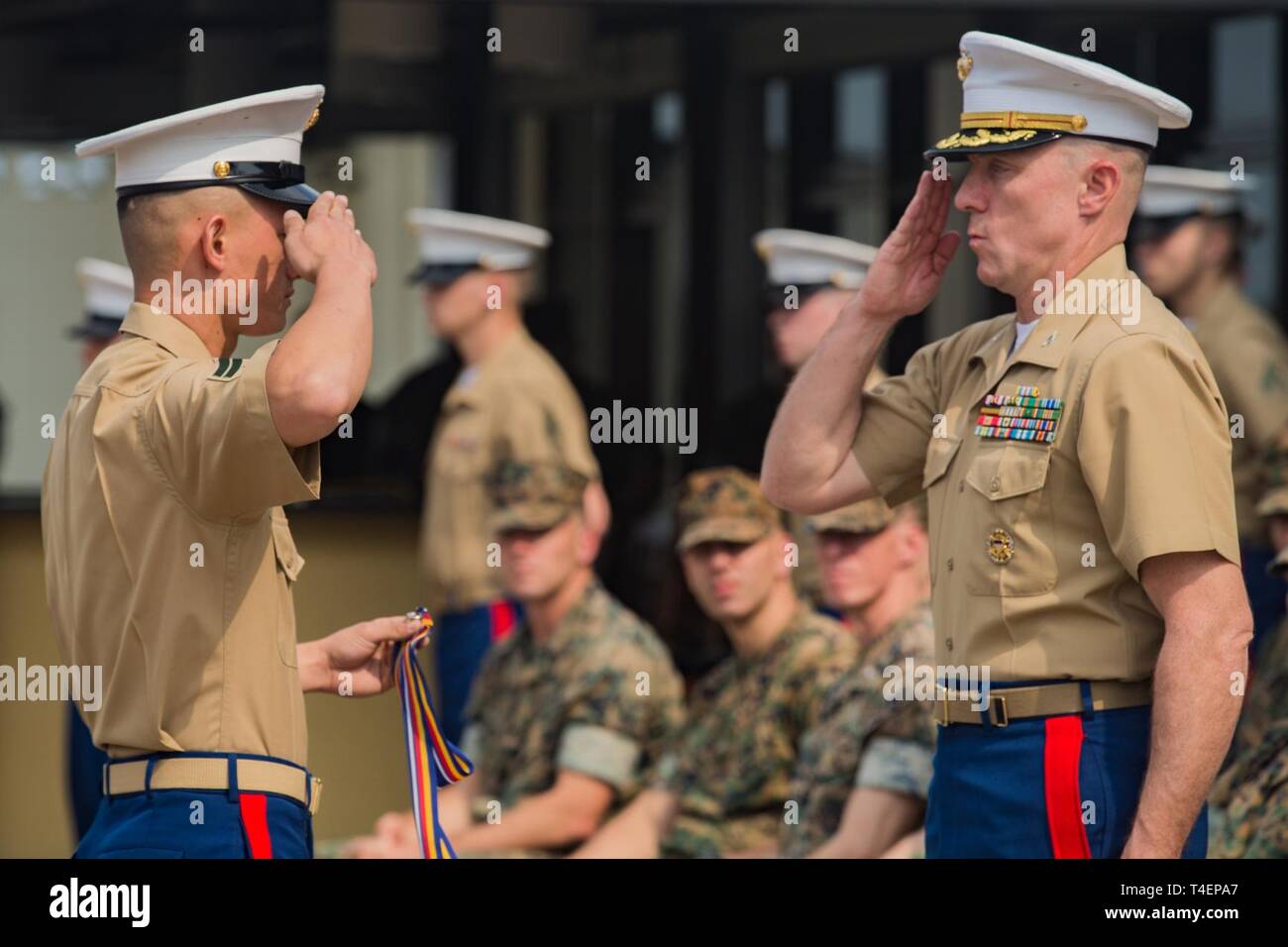 U.S. Marines of Marine Air Control Group 18 (MACG-18) adorn battle ...