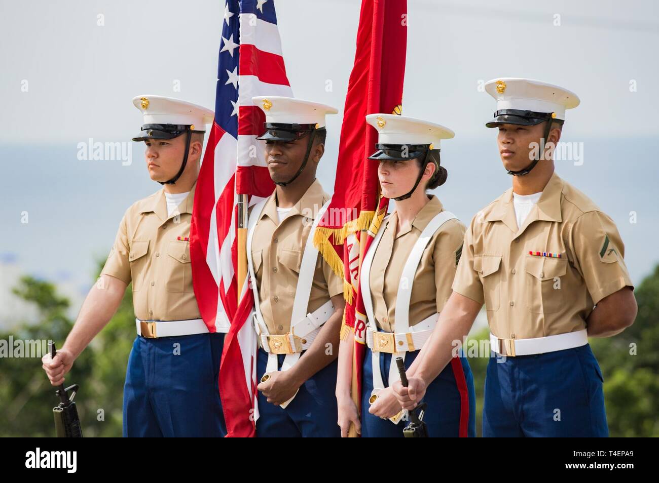 U.S. Marines of Marine Air Control Group 18 (MACG-18) adorn battle ...