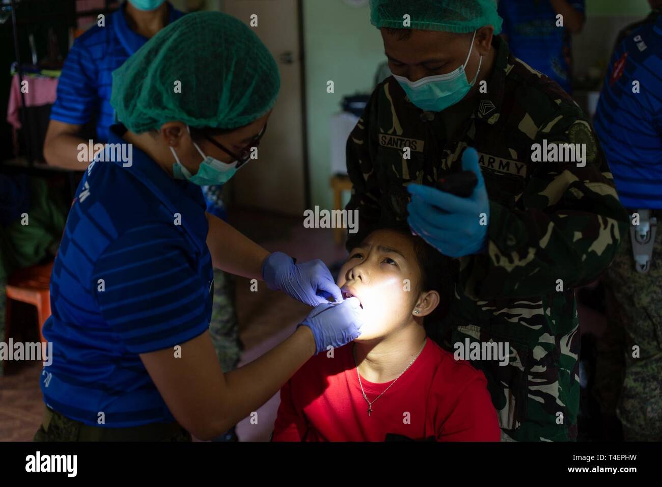 Philippine Medical Corps 1st Lt. Mary Grace Tabajen and Sgt. Laurence ...