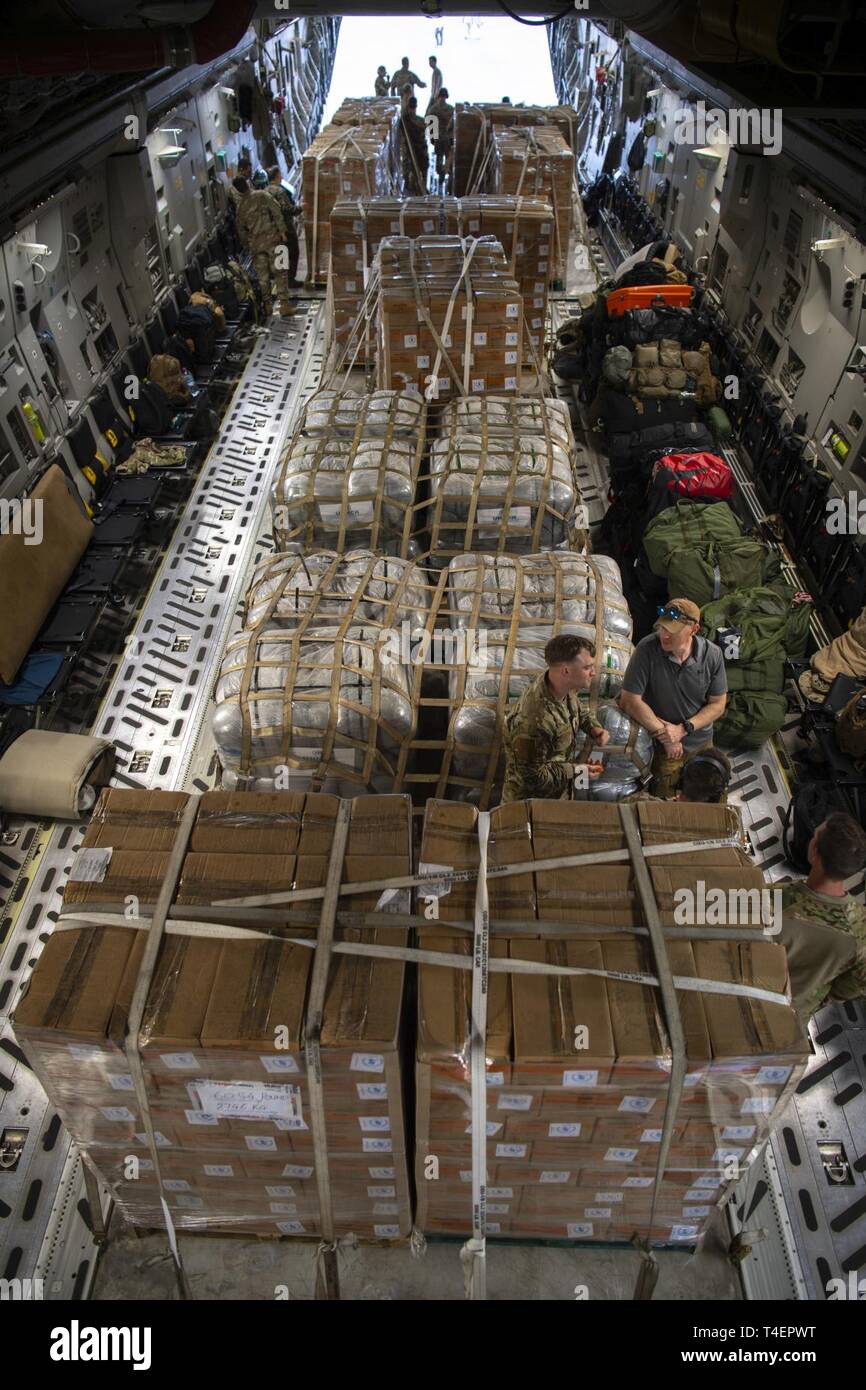 U.S. military personnel load Plumpy Sup from the World Food Programme ...