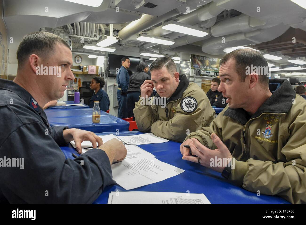 OCEAN (Apr. 2, 2019) Chief Petty Officers conduct a performance record ...