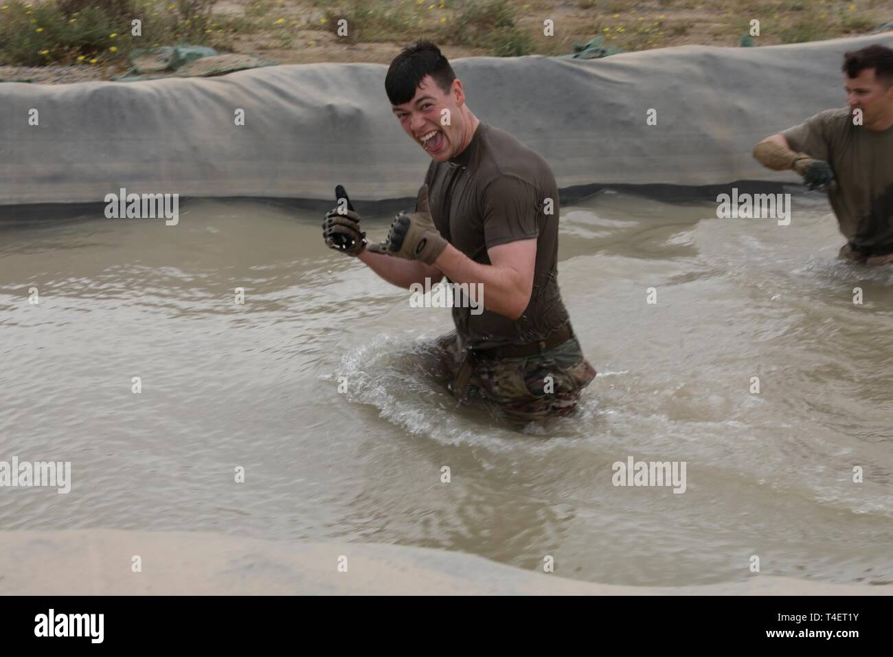 CAMP ARIFJAN, Kuwait -- Army Capt. Matthew Crocker, battle captain ...