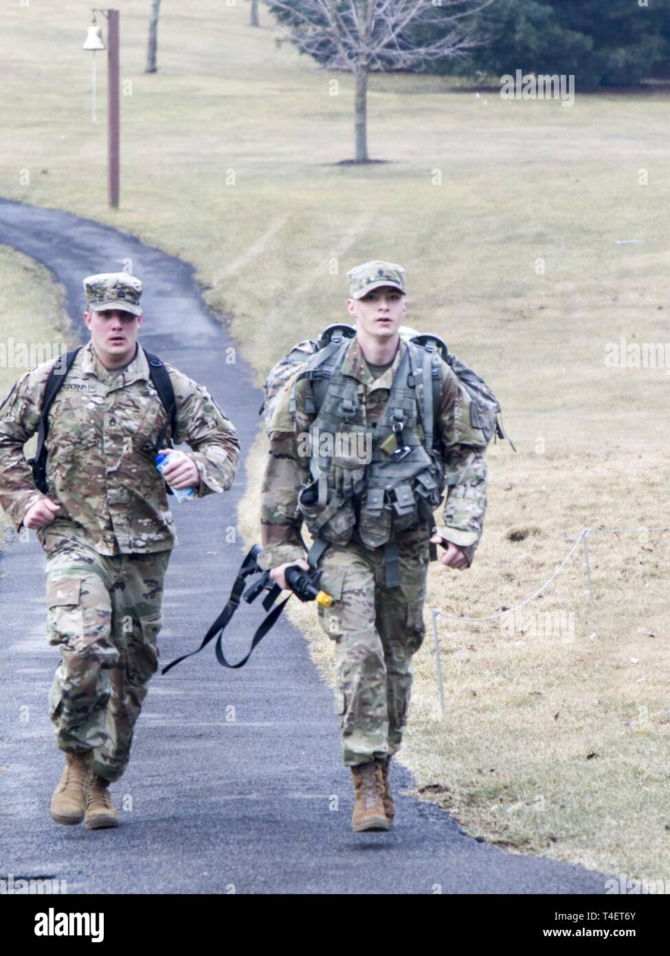U.S. Army Spc. Edward Logel, right, a military policeman assigned to ...