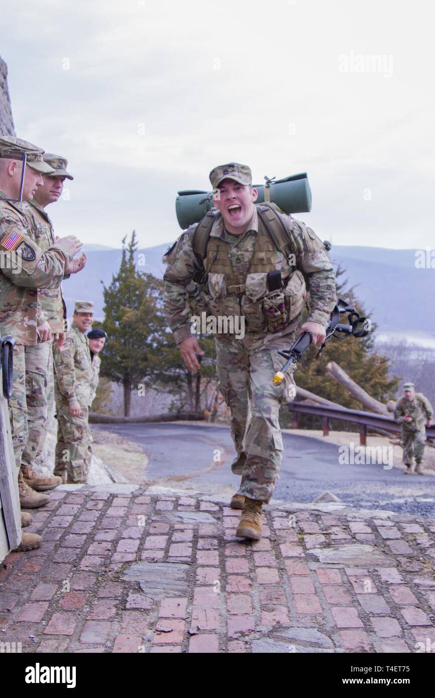 U.S. Army Sgt. 1st Class Martin Cozens, an infantryman assigned to Alpha Company, 2nd Battalion ...