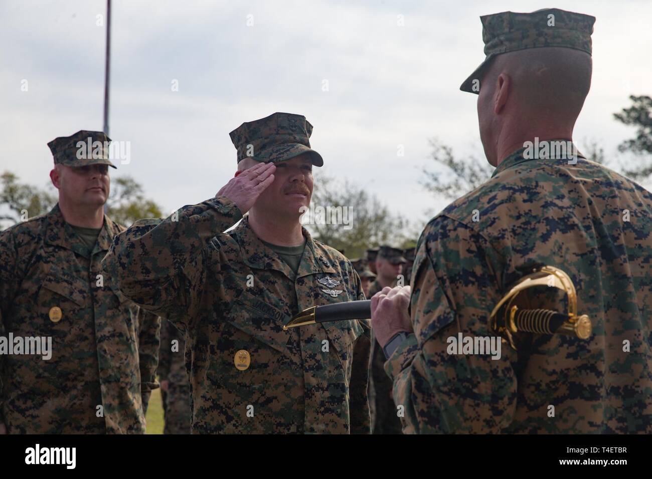 U.S. Navy Master Chief Petty Officer Richard A. Jackson, on-coming ...