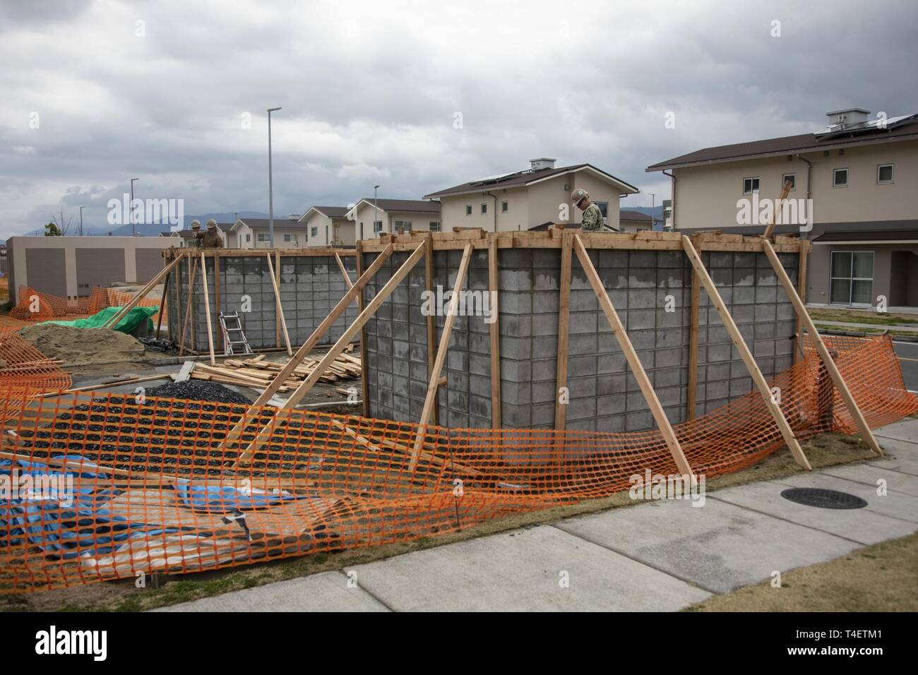 U.S. Navy Seabees with Naval Mobile Construction Battalion 3 Detachment ...