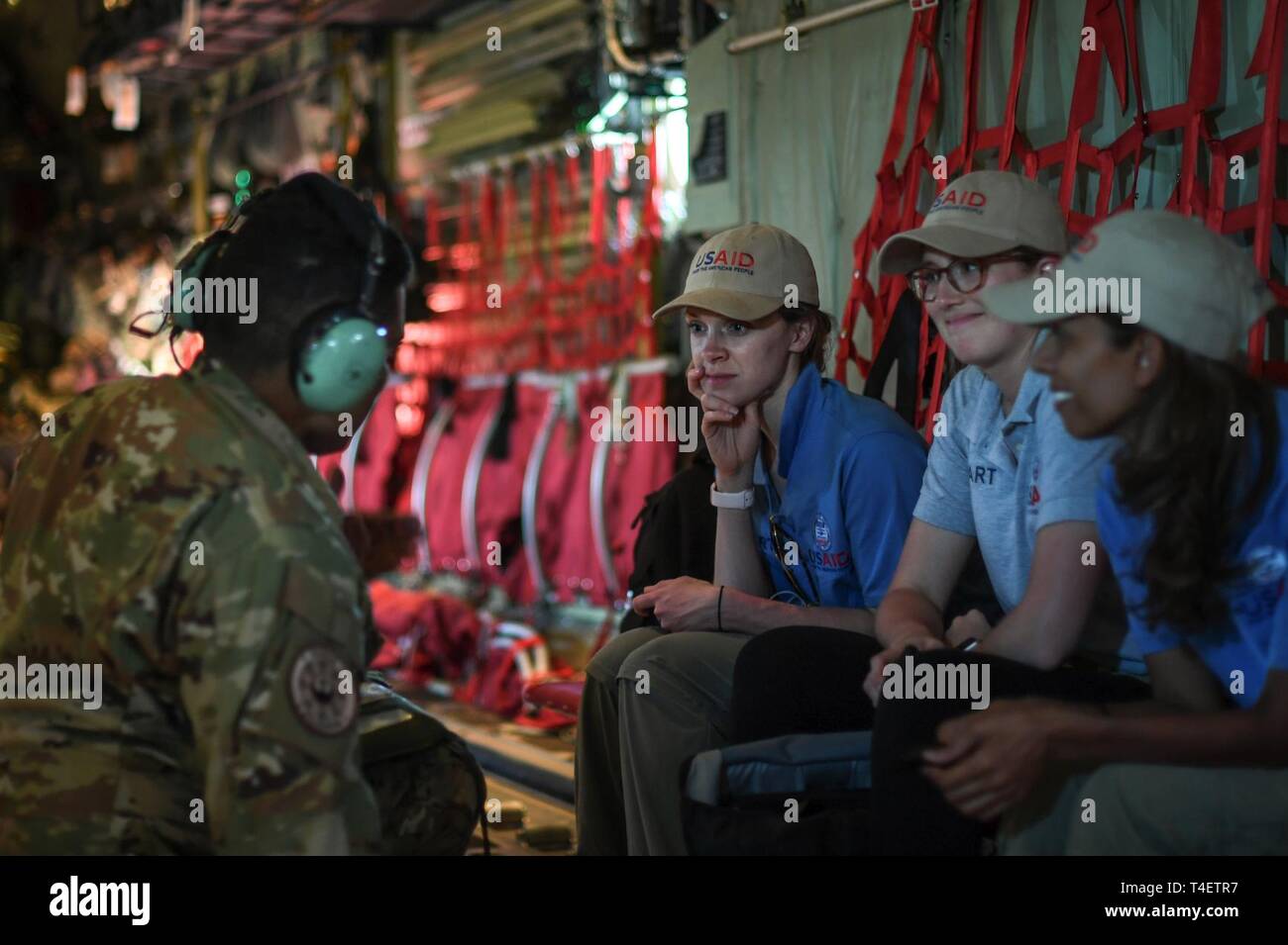 United nations aid workers helping hi-res stock photography and images ...