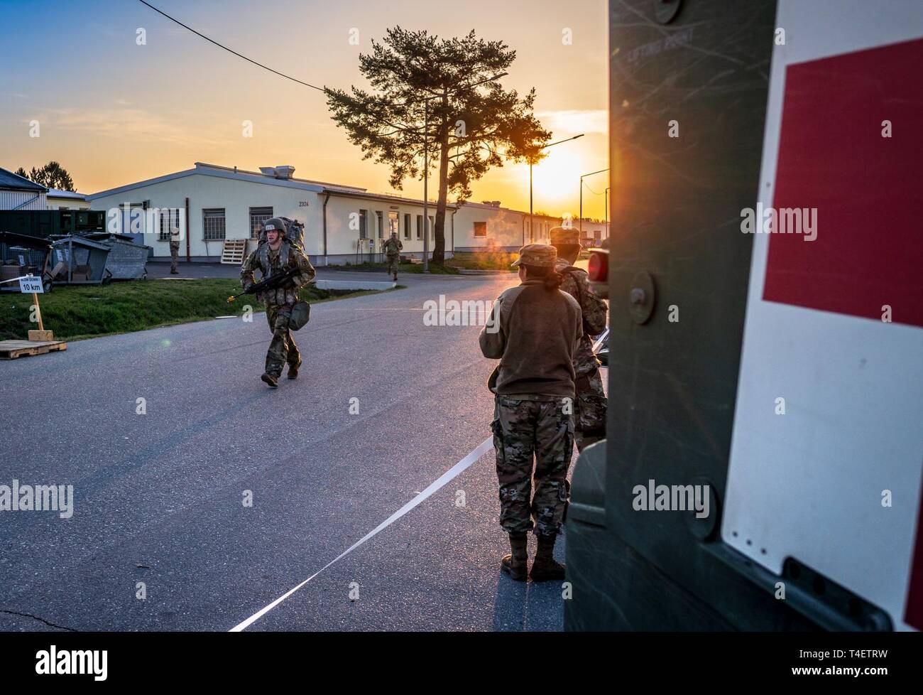 U.S. Army Capt. Michael Mooney, assigned to LRHC, crosses the 12-mile ...