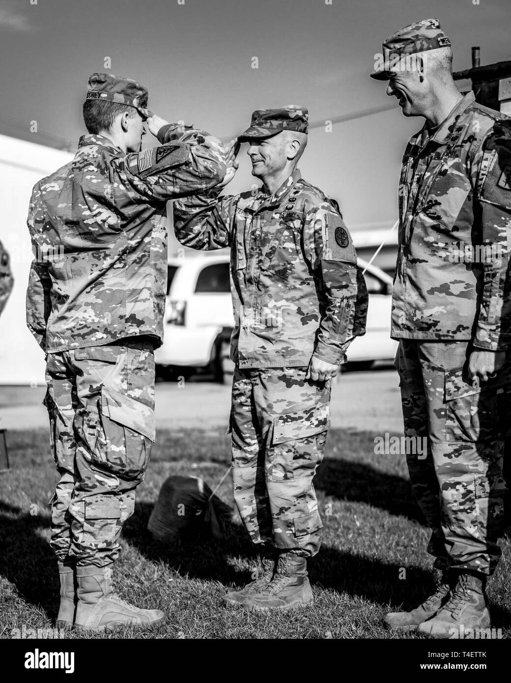 U.S. Army Brig. Gen Ron Stephens, RHCE's Commanding General, awards the ...