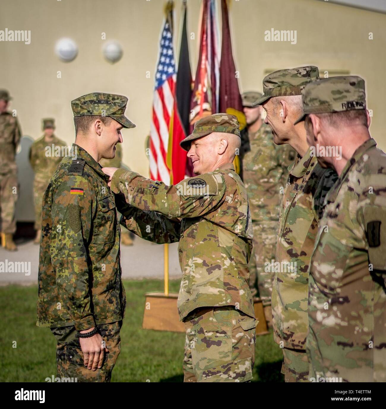 U.S. Army Brig. Gen Ron Stephens, RHCE's Commanding General, awards the ...