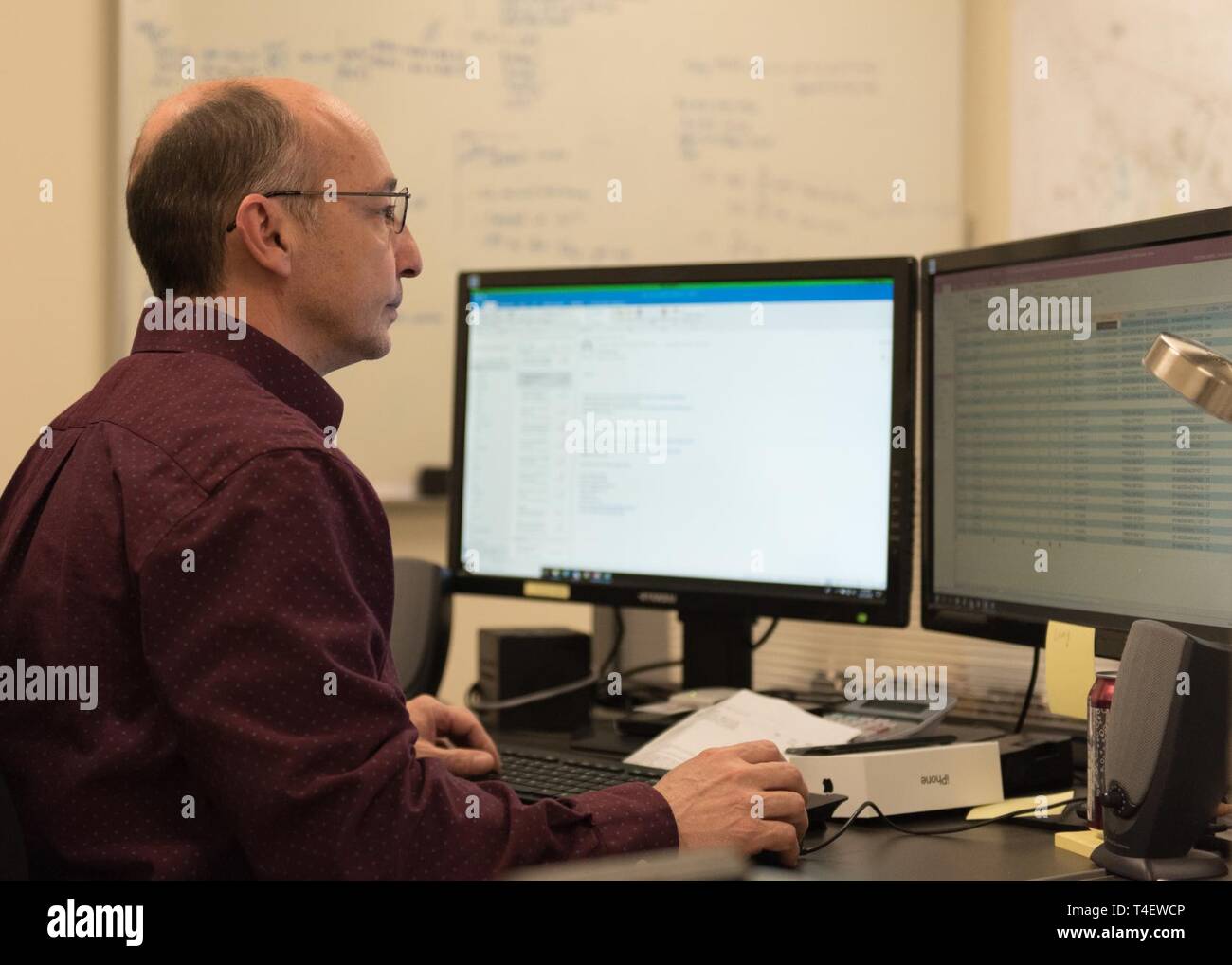 Civilian Airman Brian Stutzman, a communications planner with the 102nd ...