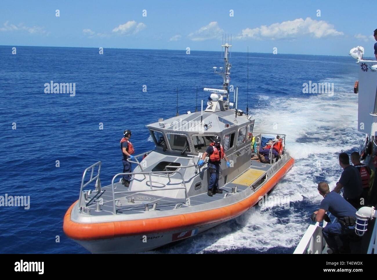 The Coast Guard Cutter Isaac Mayo (WPC-1112) receives the 10 illegal ...