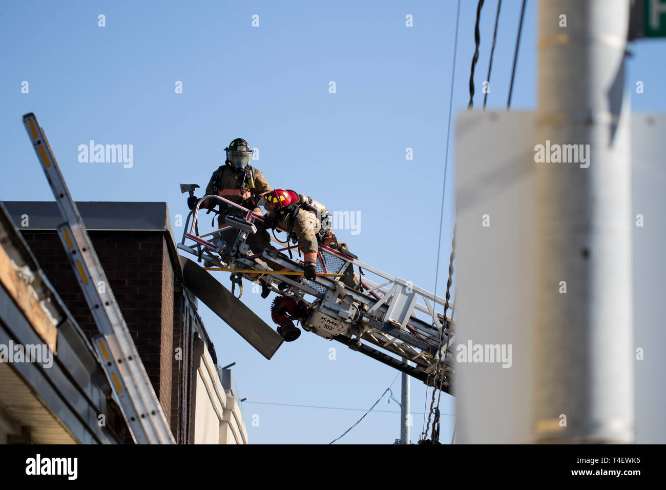 Ontario Canada April 13 2019:Fireman holding axe while battling ...