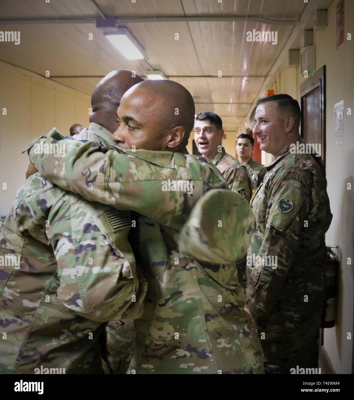 Capt. Julius Price leans in for a farewell hug and absorbs a moment of ...