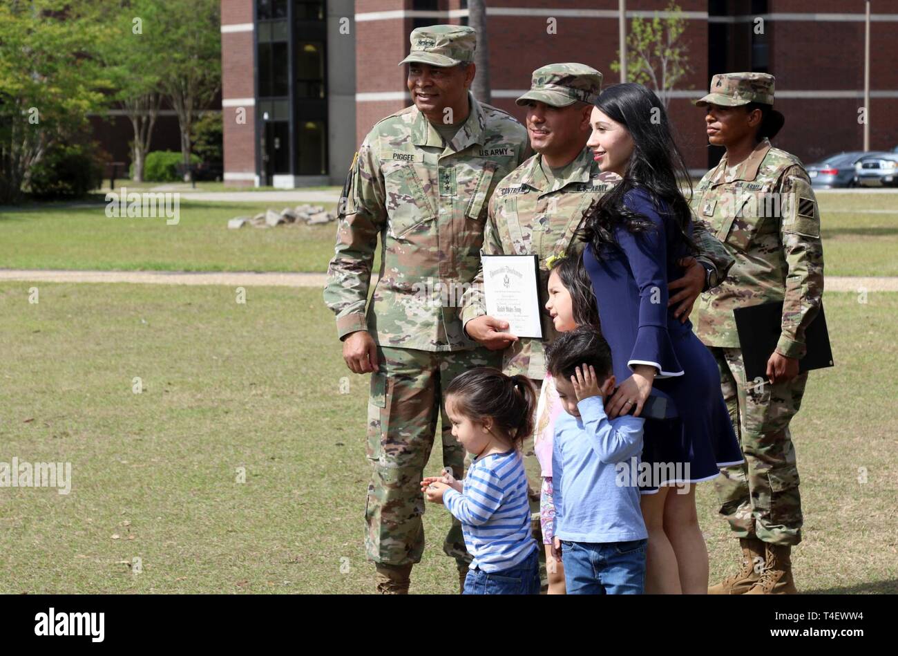 DCS G4, Lt. Gen. Aundre Piggee poses with a Soldier and his family from ...