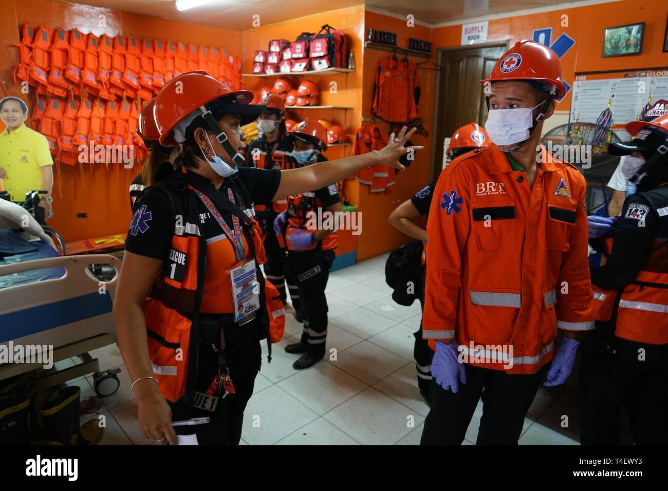 Batasan Hill Barangay Rescue Manager Mrs. Geraldine Ghie directs the ...