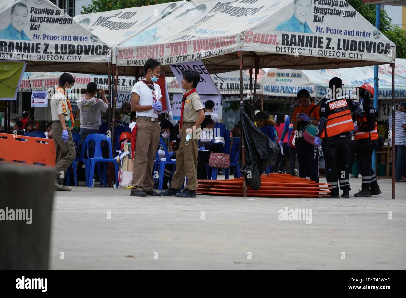 Philippine Boy Scouts provide support at the triage tent during the ...