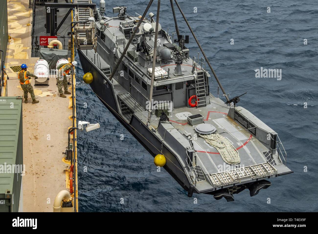 SANTA RITA, Guam (April 4, 2019) Sailors assigned to Navy Cargo ...
