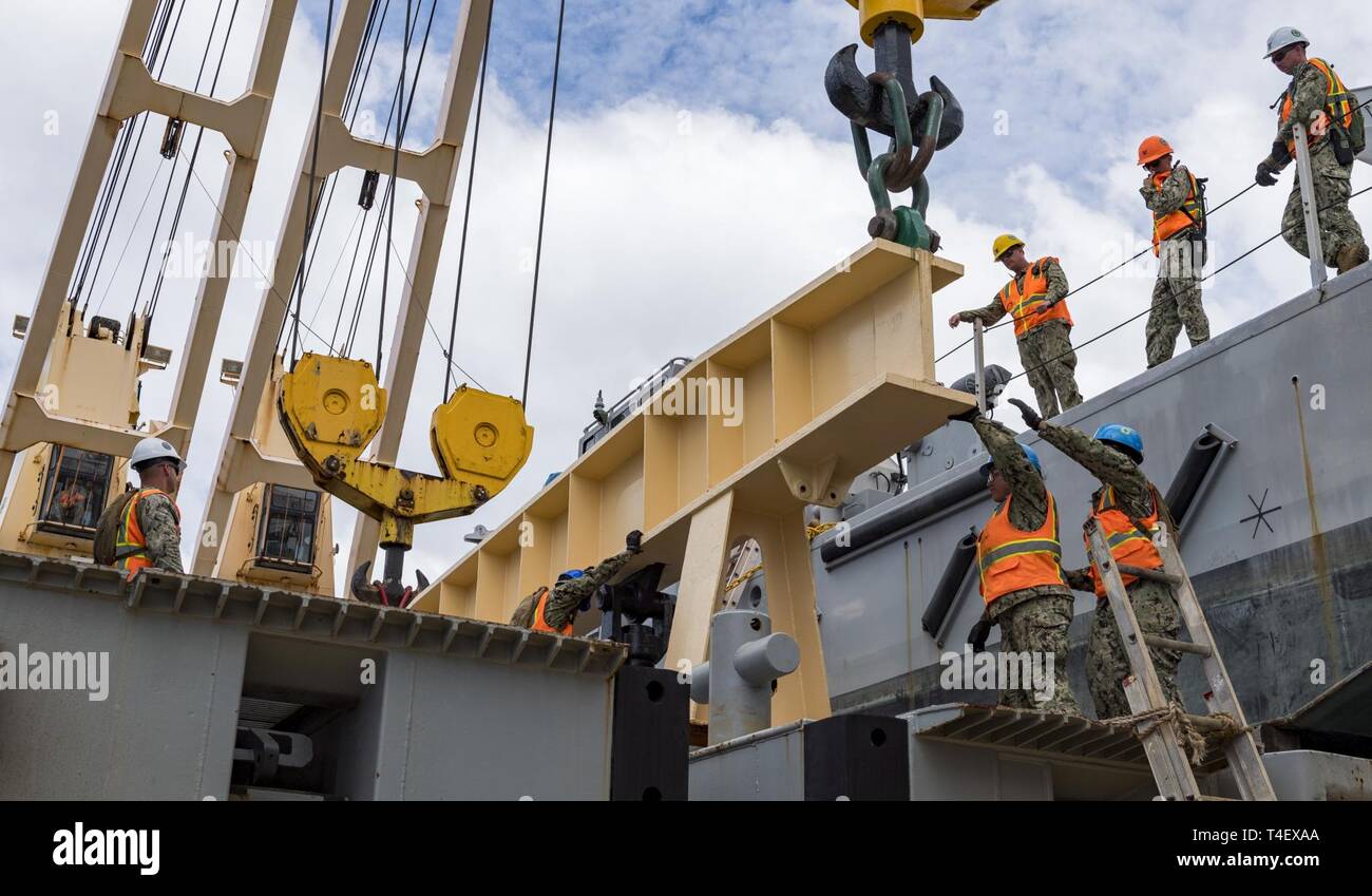 SANTA RITA, Guam (April 4, 2019) Sailors, assigned to Navy Cargo ...