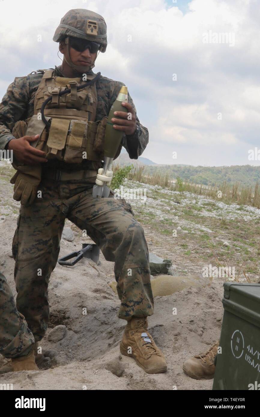 U.S. Marine Corps Lance Cpl. Fidel Martinez, a mortarman with Weapons ...