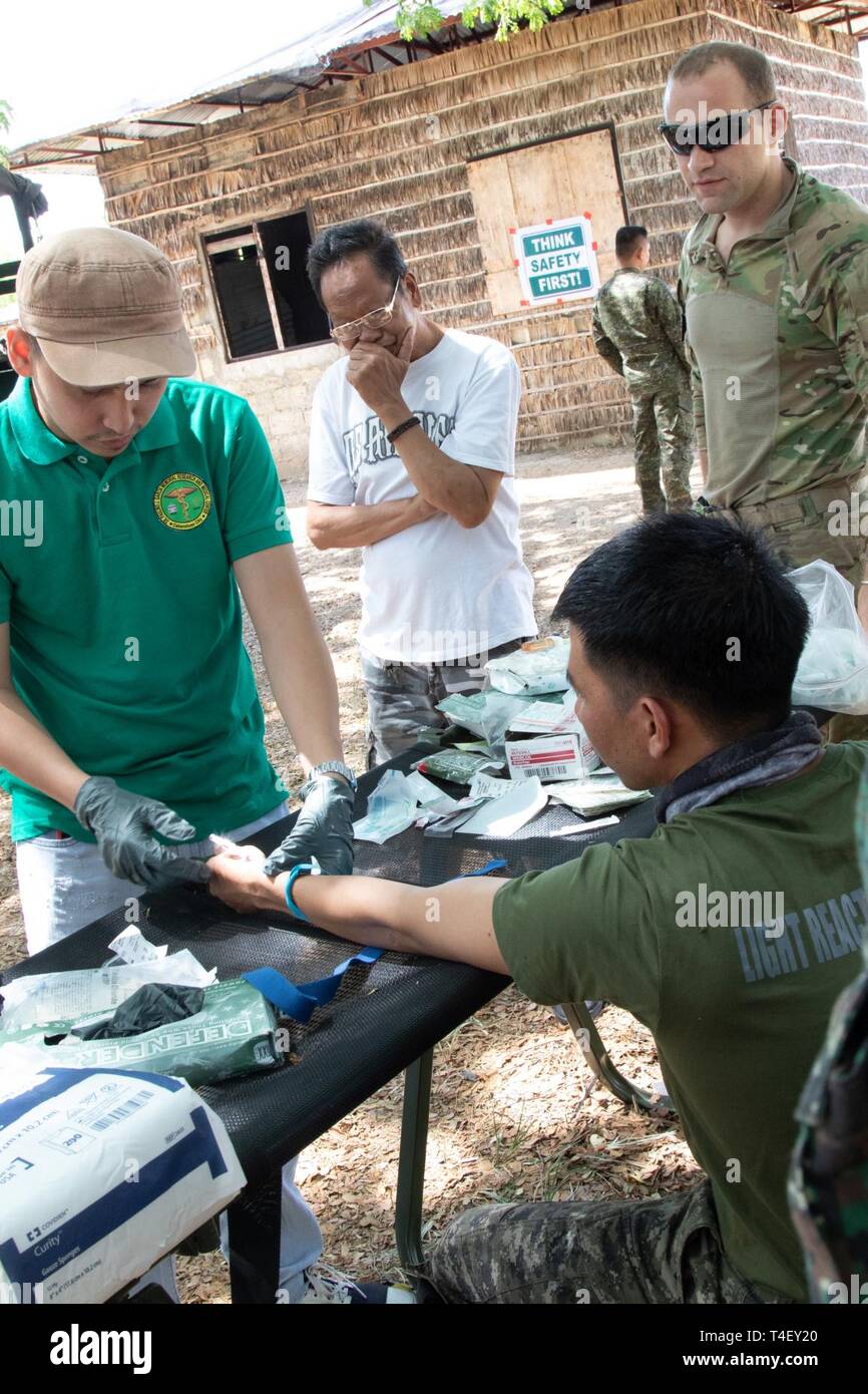 A local nurse from the Dr. Paulmo J. Garcia Memorial Research and ...