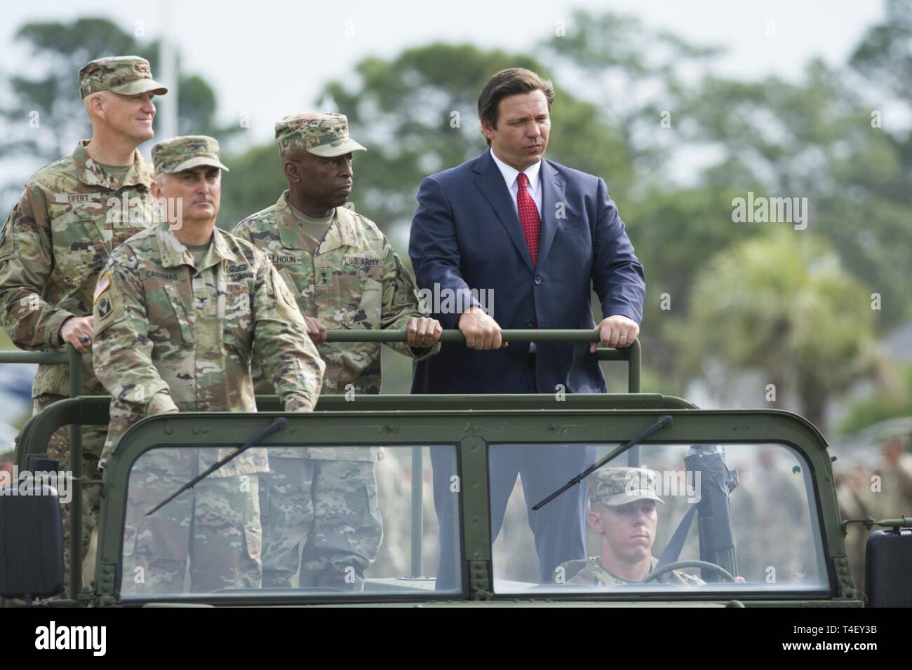 Gov. Ron DeSantis (right), commander in chief of the Florida National ...