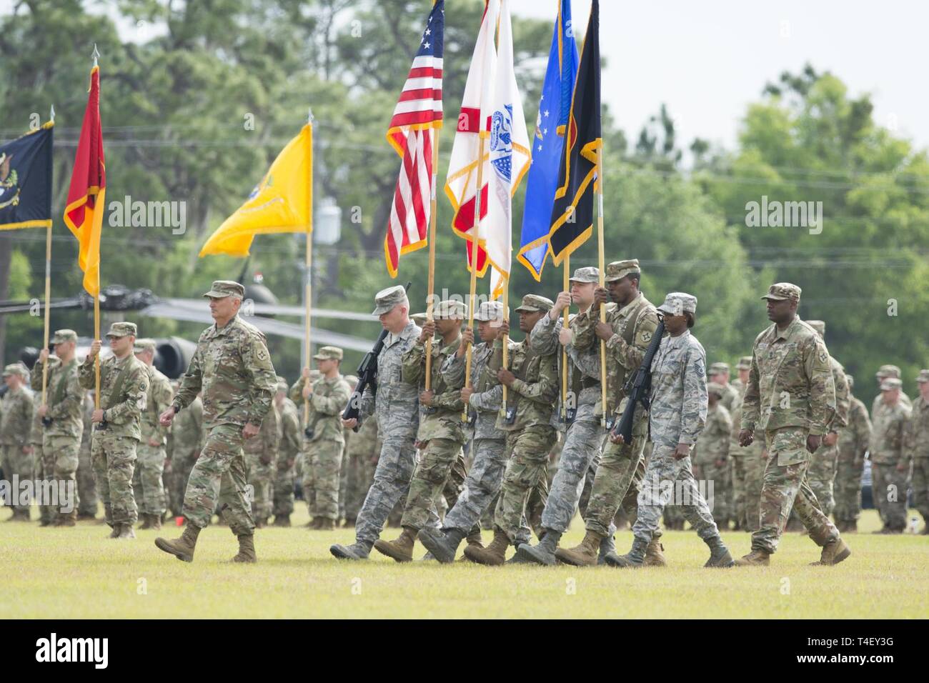Airmen and Soldiers of the Florida National Guard present the colors ...