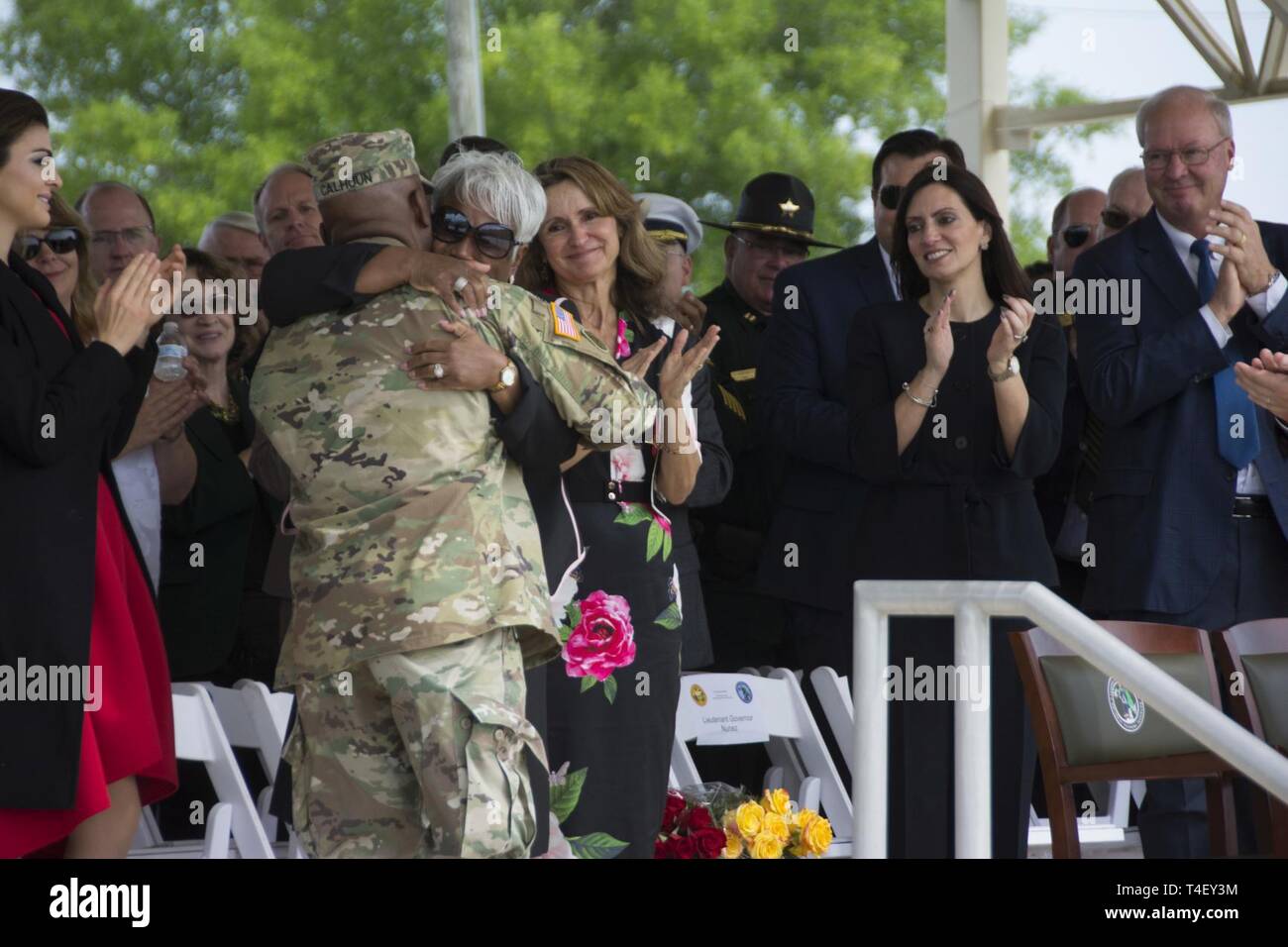 Maj. Gen. Michael Calhoun, outgoing adjutant general of Florida, hugs ...
