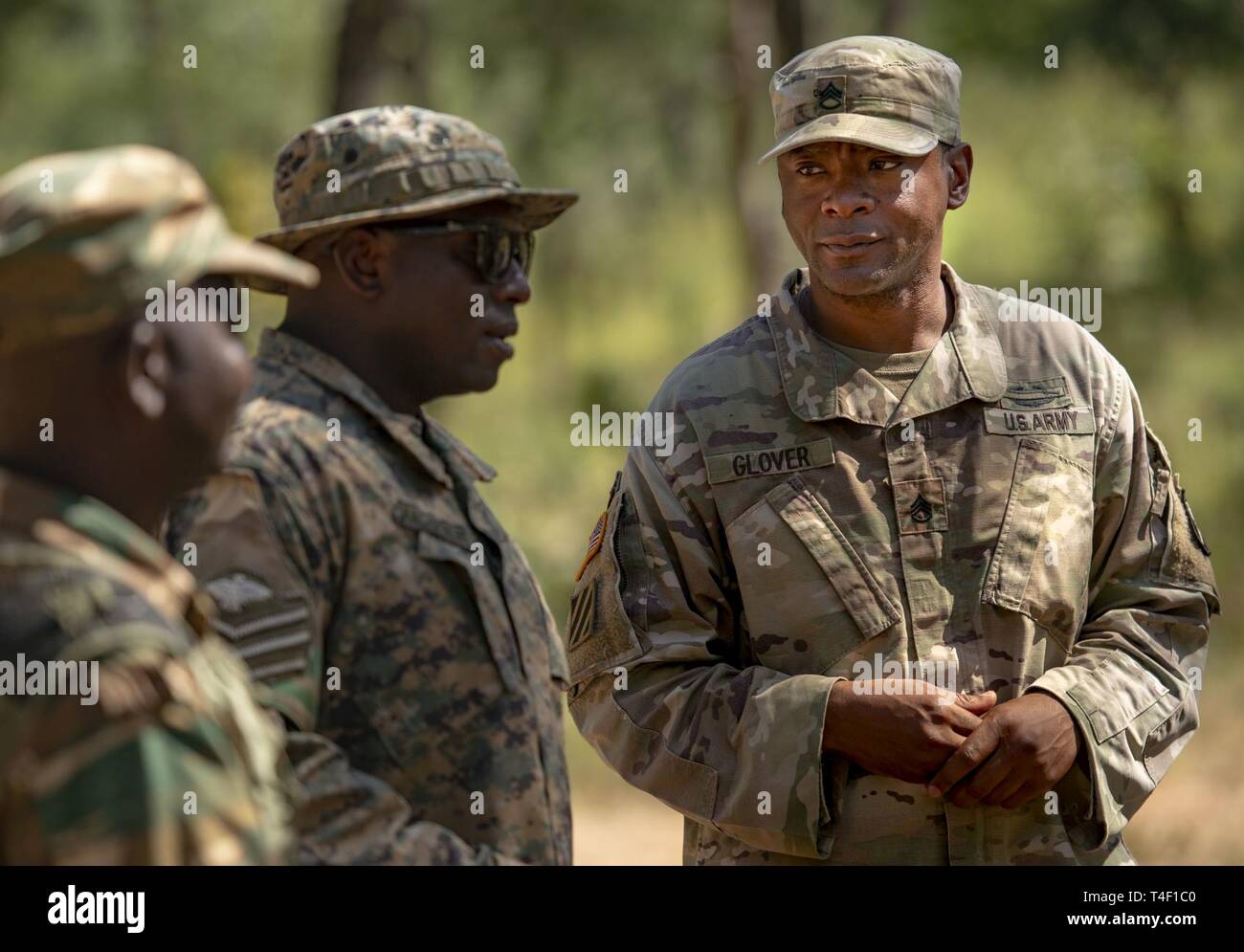 A Zambian soldier talks through troop positioning and communication ...