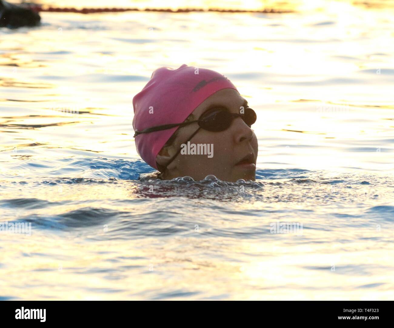 Capt. Sarah Salvo, 108th Sustainment Brigade, swims 100 meters for the ...