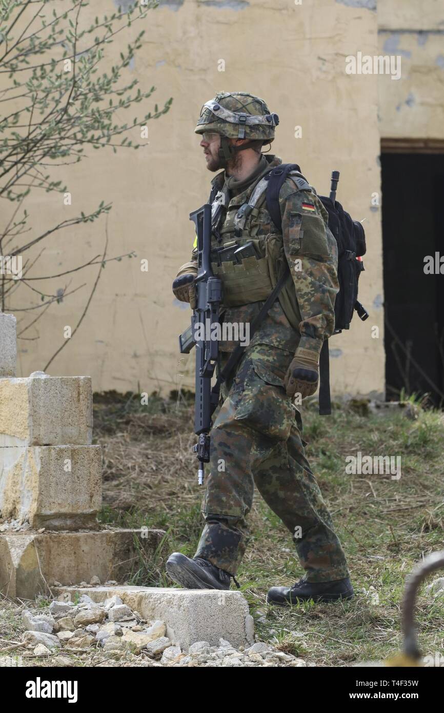 Hohenfels, Germany – A German soldier conducts a security patrol during ...