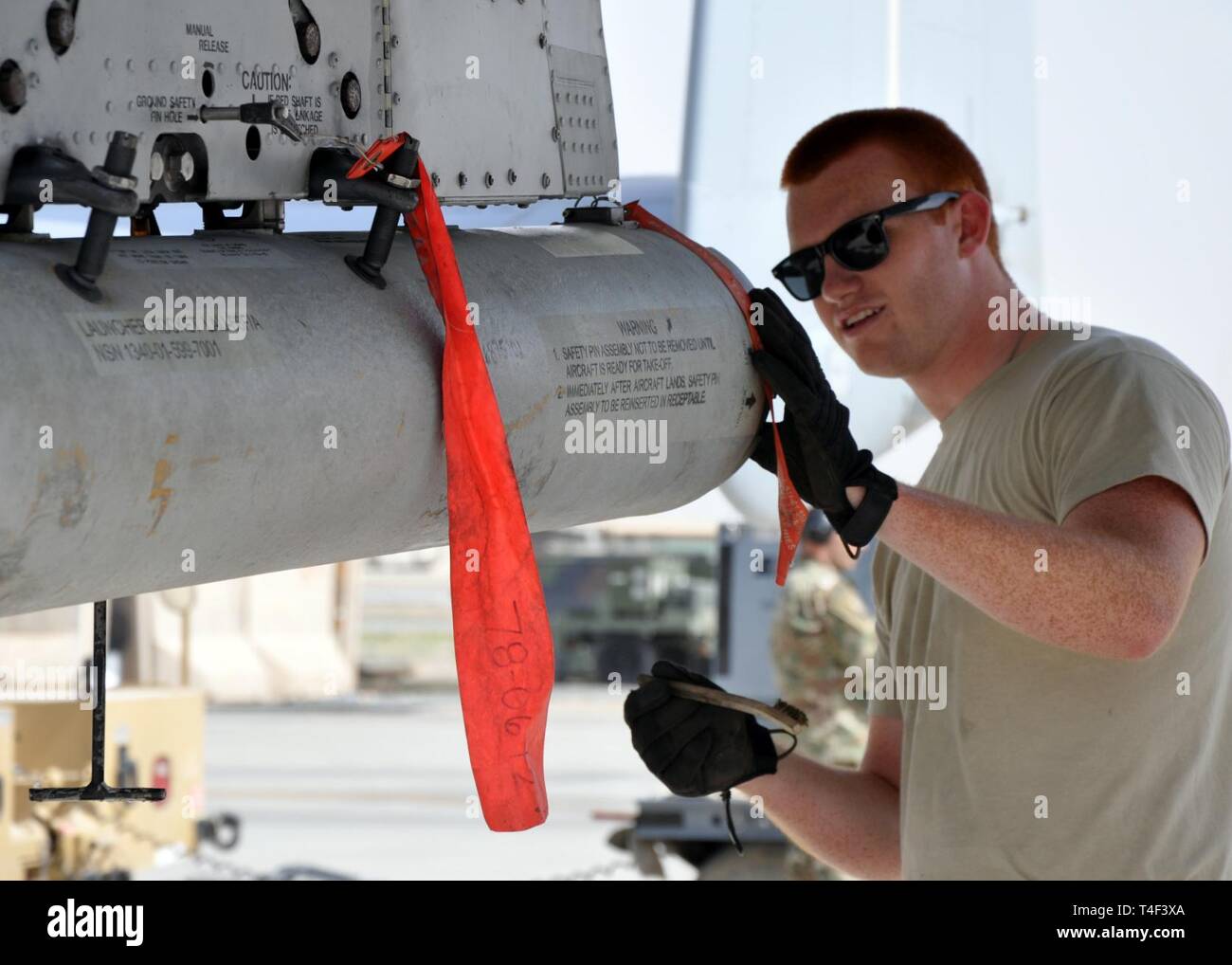 An Airman from the 451st Expeditionary Aircraft Maintenance Squadron ...