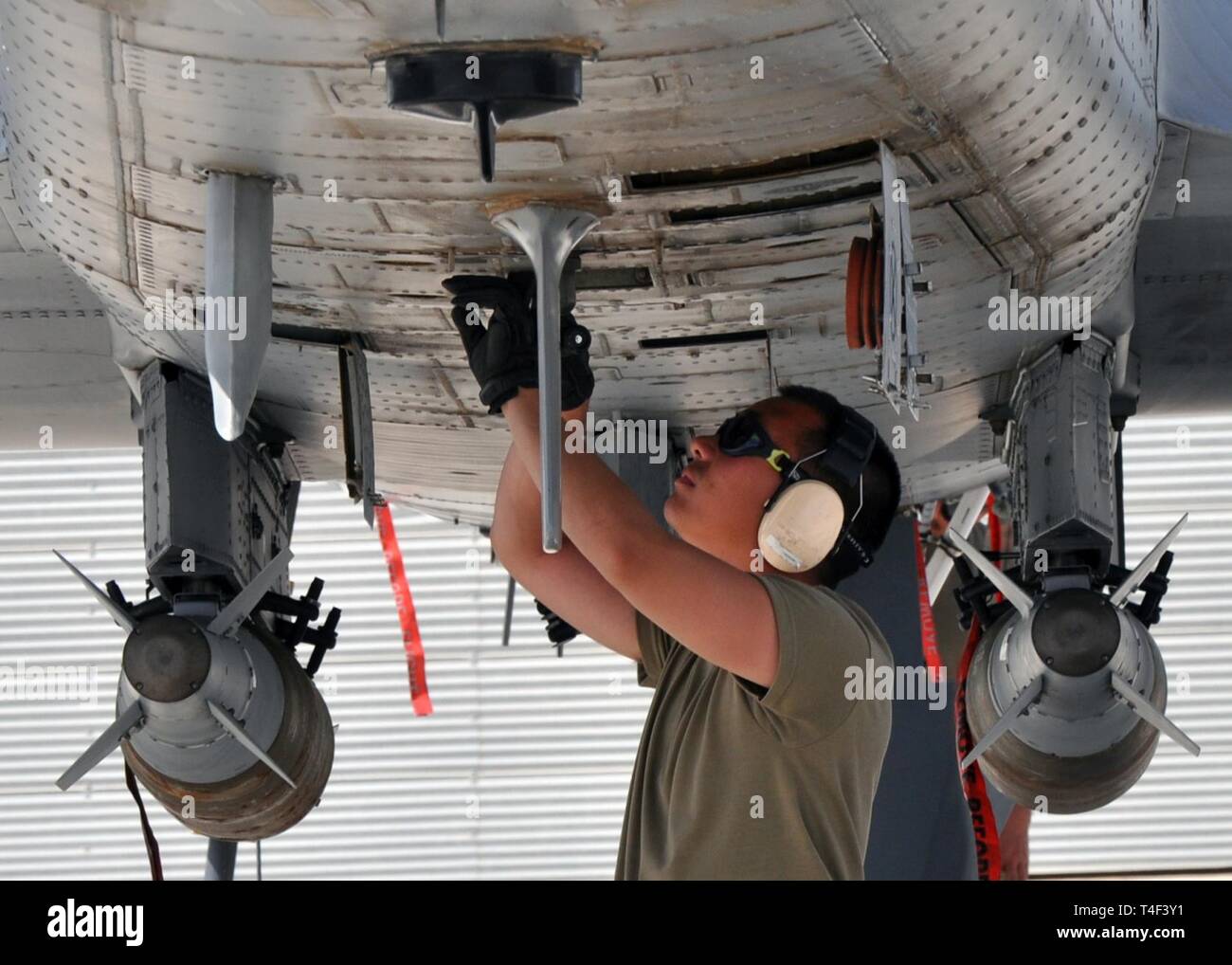 An Airman from the 451st Expeditionary Aircraft Maintenance Squadron ...