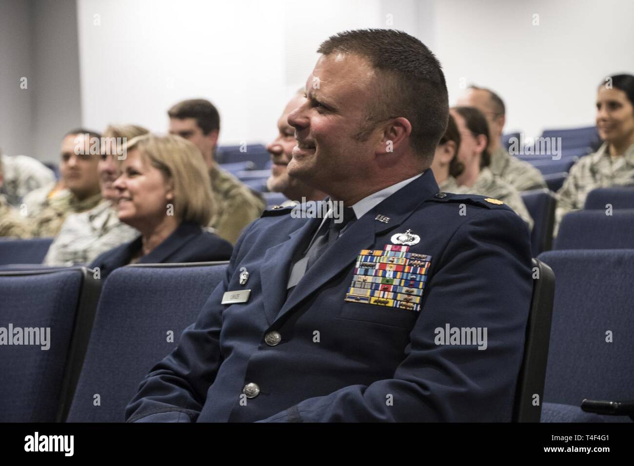 The 152nd Comptroller Flight commander, Maj. Shaun Cruze is promoted to ...