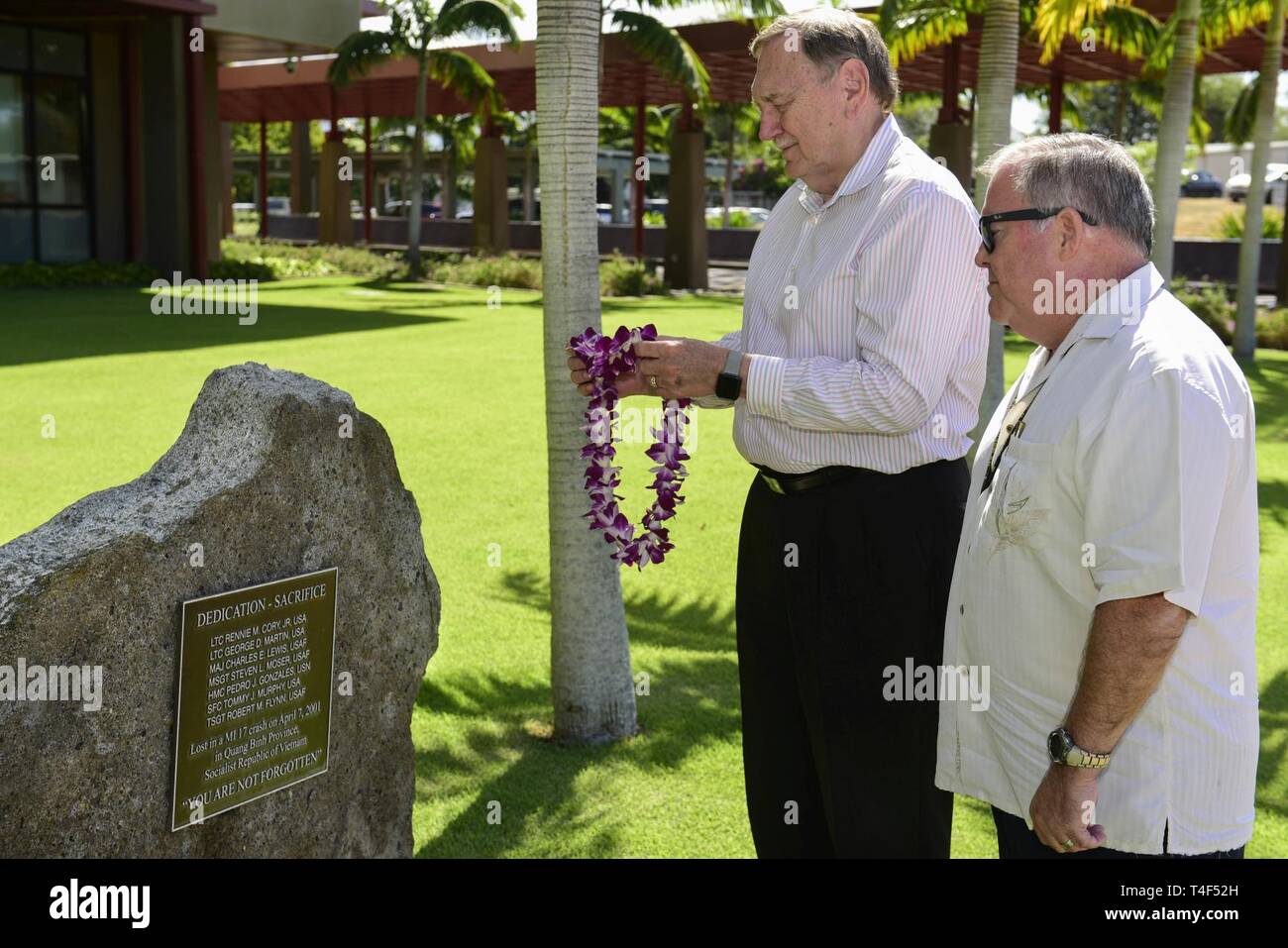 Johnie E. Webb, deputy director, (left), and Steve Thompson, family and ...