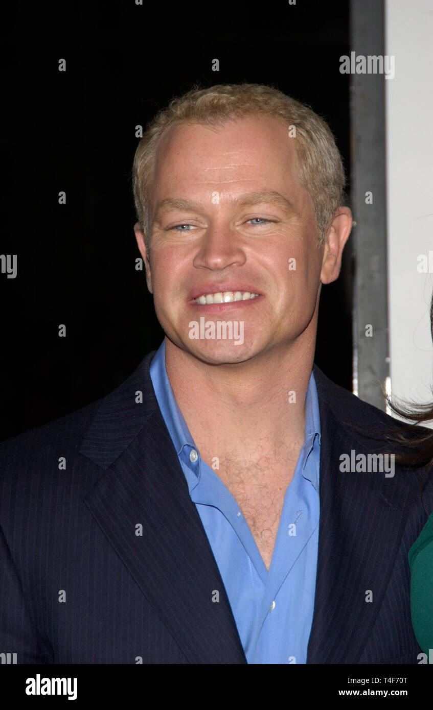 LOS ANGELES, CA. March 29, 2004: Actor NEAL McDONOUGH & wife at the ...