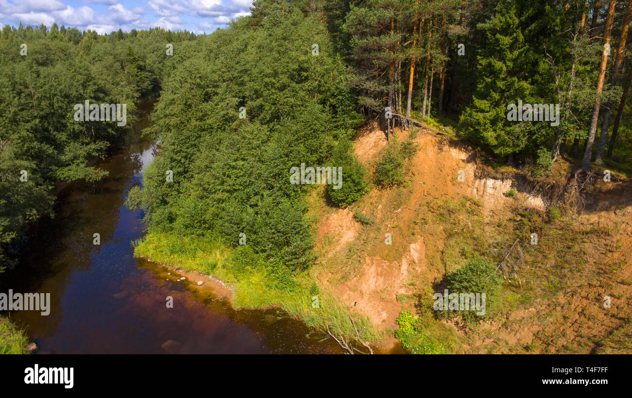 High sandy bank of the Polomet River, Novgorod Region, Russia Stock ...
