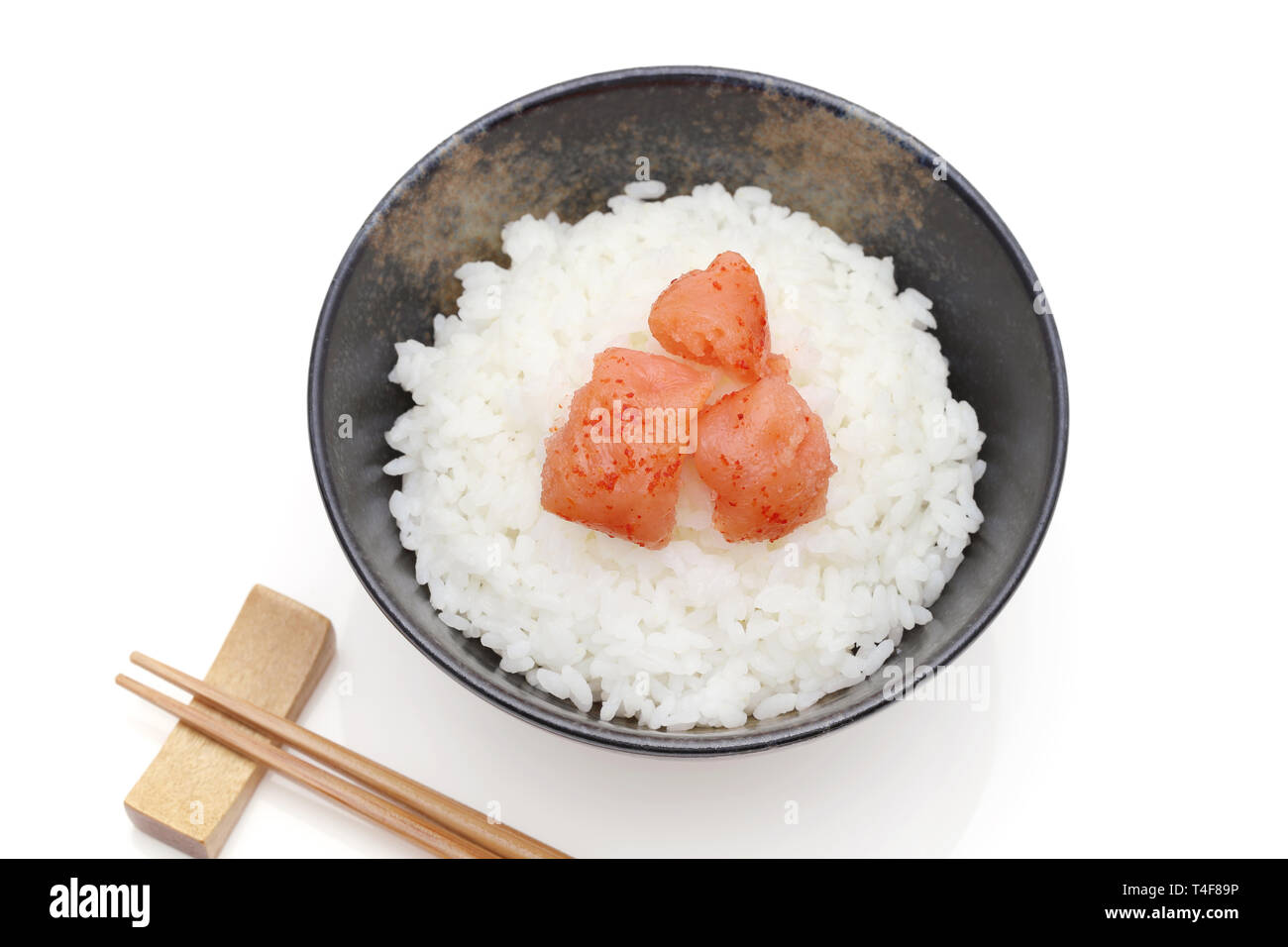 Japanese cooked white rice with karashi mentaiko on white background ...