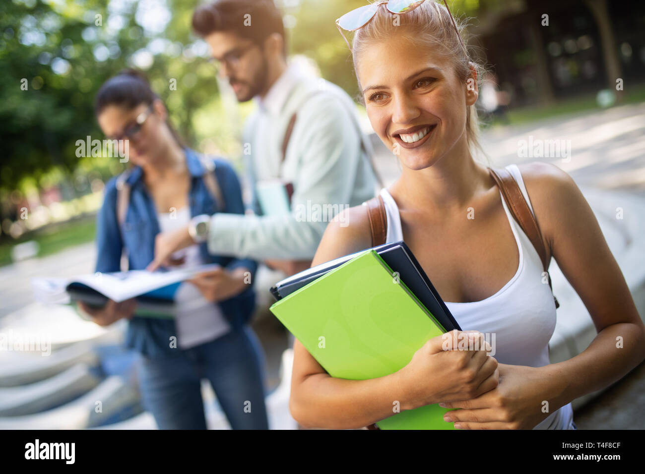 Group of friends studying together at university campus Stock Photo - Alamy