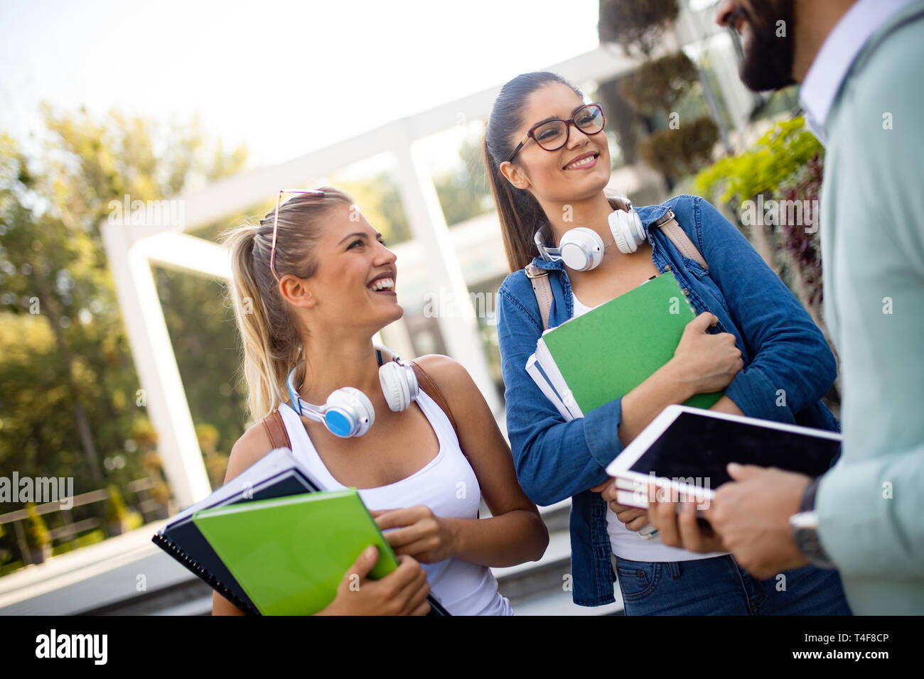 Group of friends studying together at university campus Stock Photo - Alamy