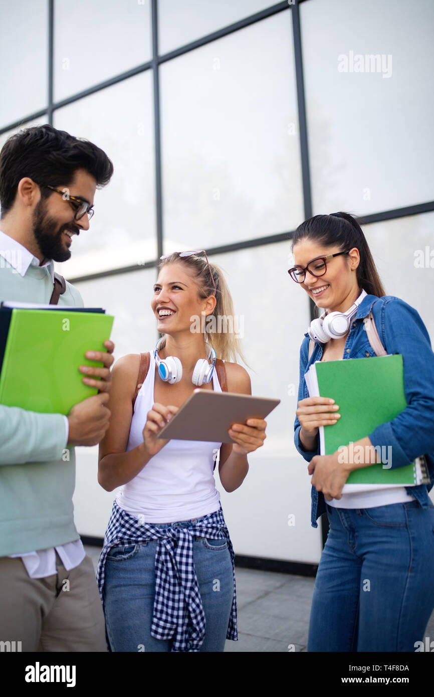 Group of friends studying together at university campus Stock Photo - Alamy