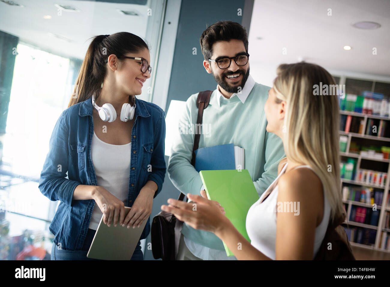 Group of friends studying together at university campus Stock Photo - Alamy