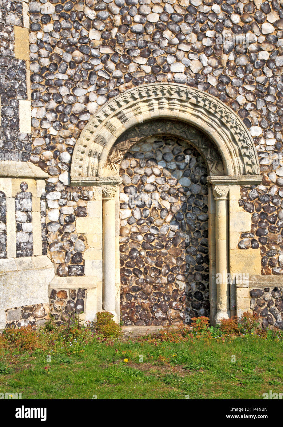 A view of the blocked southern doorway with Norman arch at the parish ...