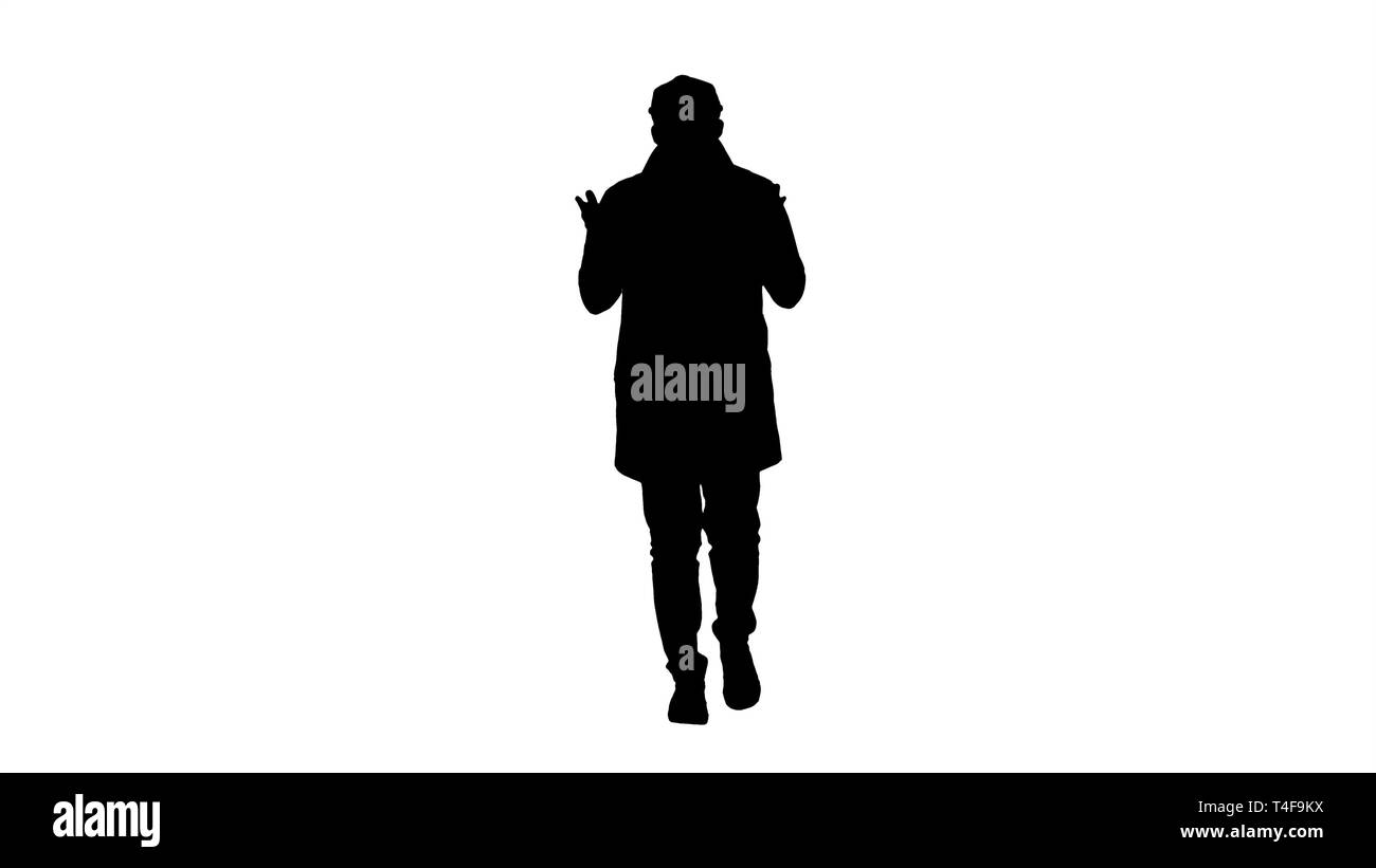 Silhouette Good work. That is it. Man walking and making gestures Stock ...